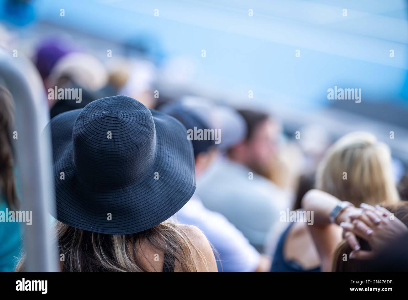 female Professional athlete Tennis player playing on a court in a ...