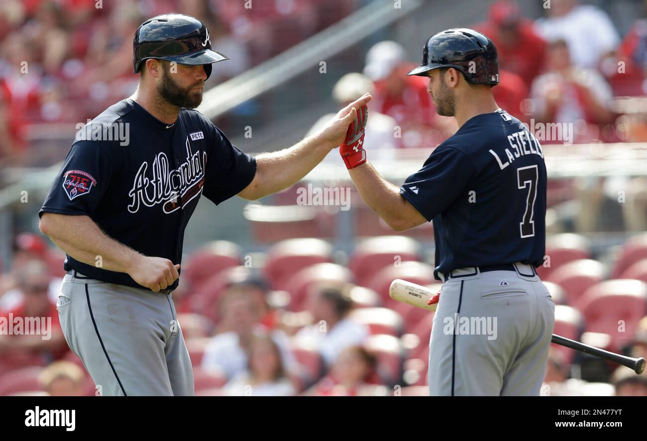 Atlanta Braves' Evan Gattis is congratulated by Tommy La Stella (7 ...