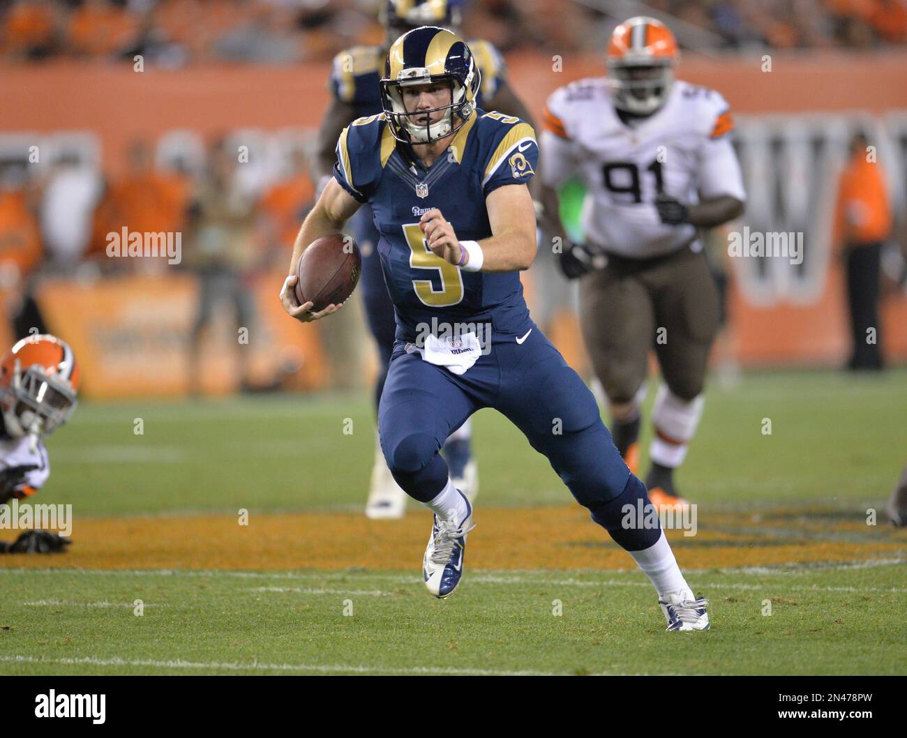 St. Louis Rams quarterback Garrett Gilbert (5) scrambles against the ...