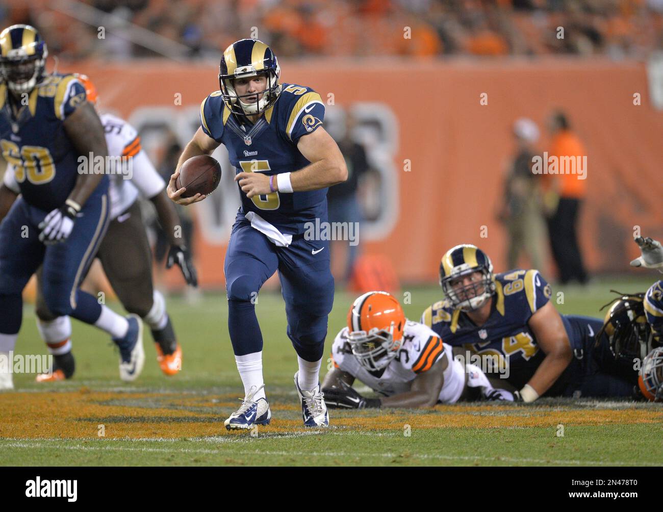 St. Louis Rams quarterback Garrett Gilbert (5) scrambles against the ...