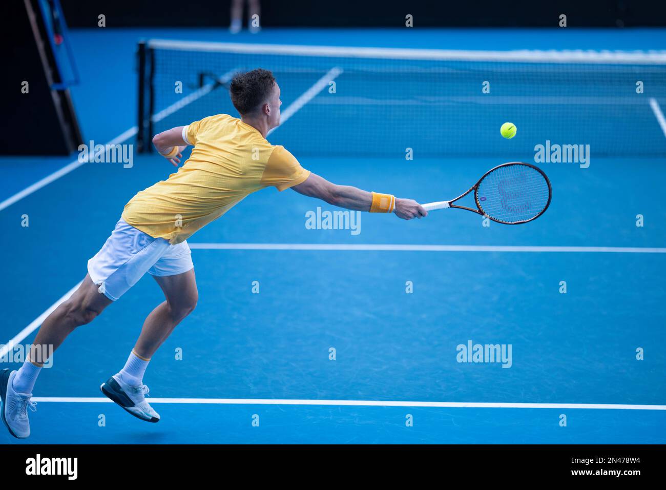 Tennis player playing on a court in a tennis tournament in summer Stock ...