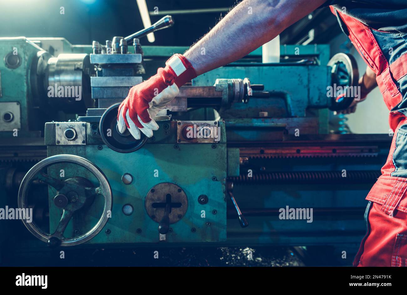 Metalworking Technician Processing Material Using Lathe. Caucasian ...