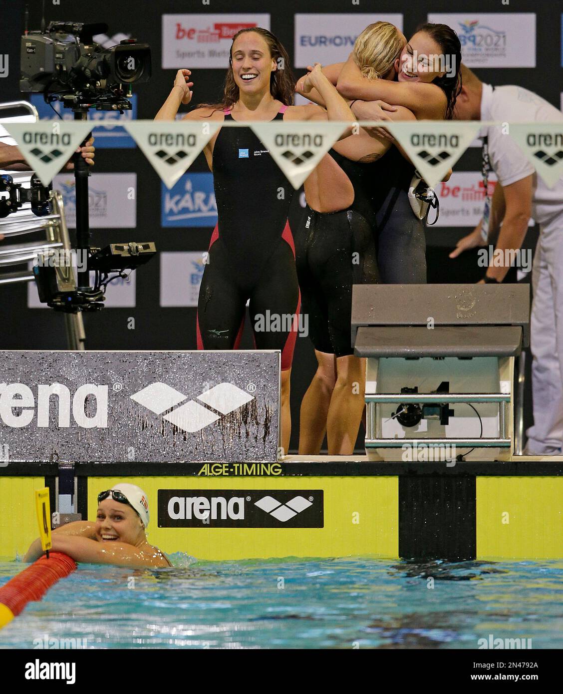 Denmark's team celebrates after winning the women's 4x100m medley final ...