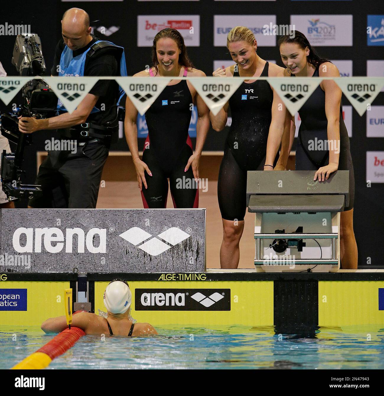 Denmark's team celebrates after winning the women's 4x100m medley final ...