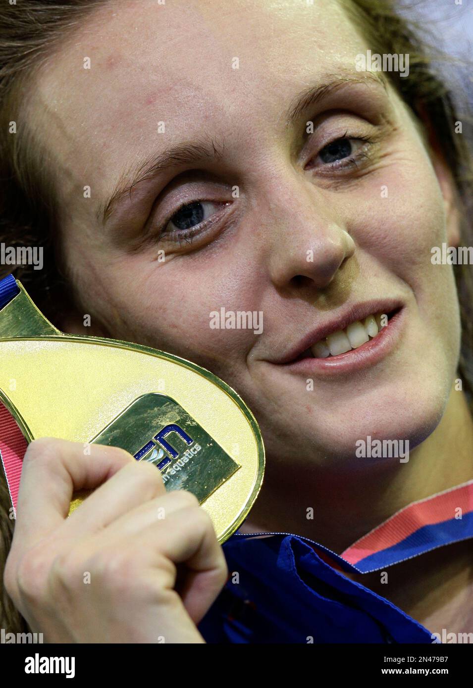 Britain's Francesca Halsall shows off her gold medal during the ...