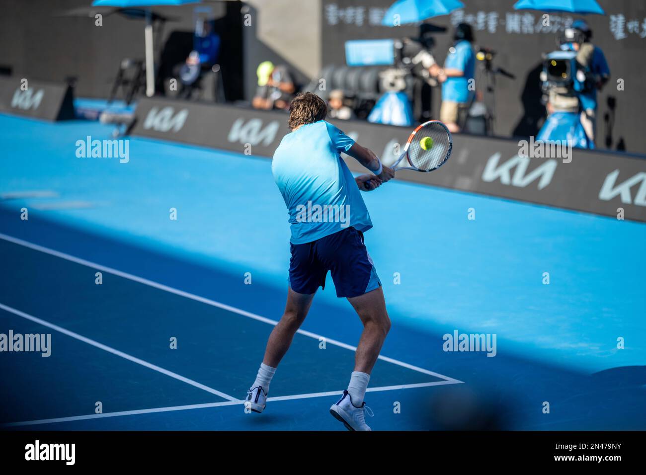 Professional athlete playing tennis on a sports court in europe Stock ...