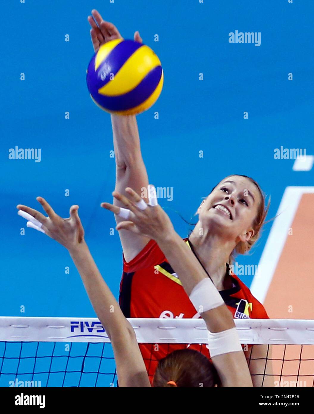 Belgian Laura Heyrman spikes the ball against Turkey during their Women ...