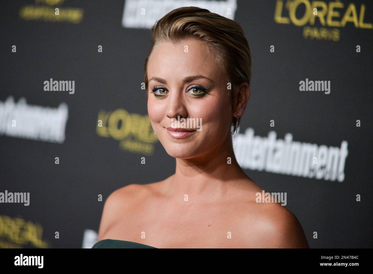 Kaley Cuoco arrives at the 2014 Entertainment Weekly Pre-Emmy Party on ...