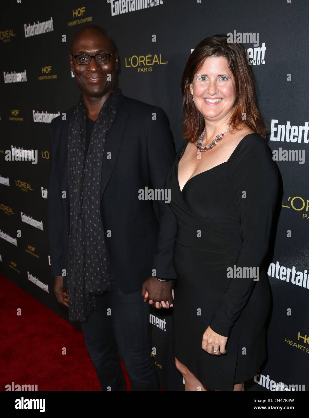 Lance Reddick, left, and Stephanie Reddick arrive at Entertainment ...