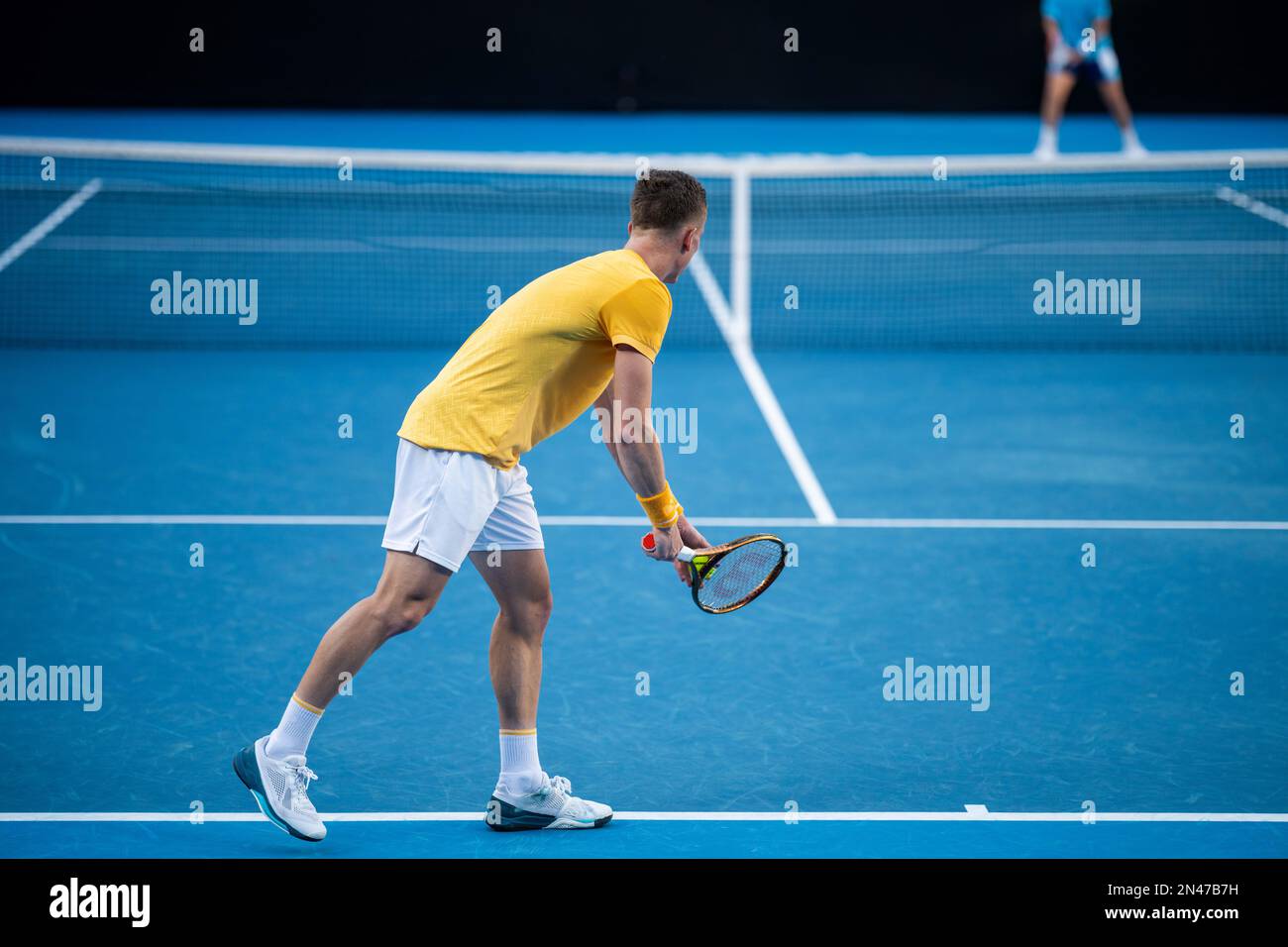 female Professional athlete Tennis player playing on a court in a ...