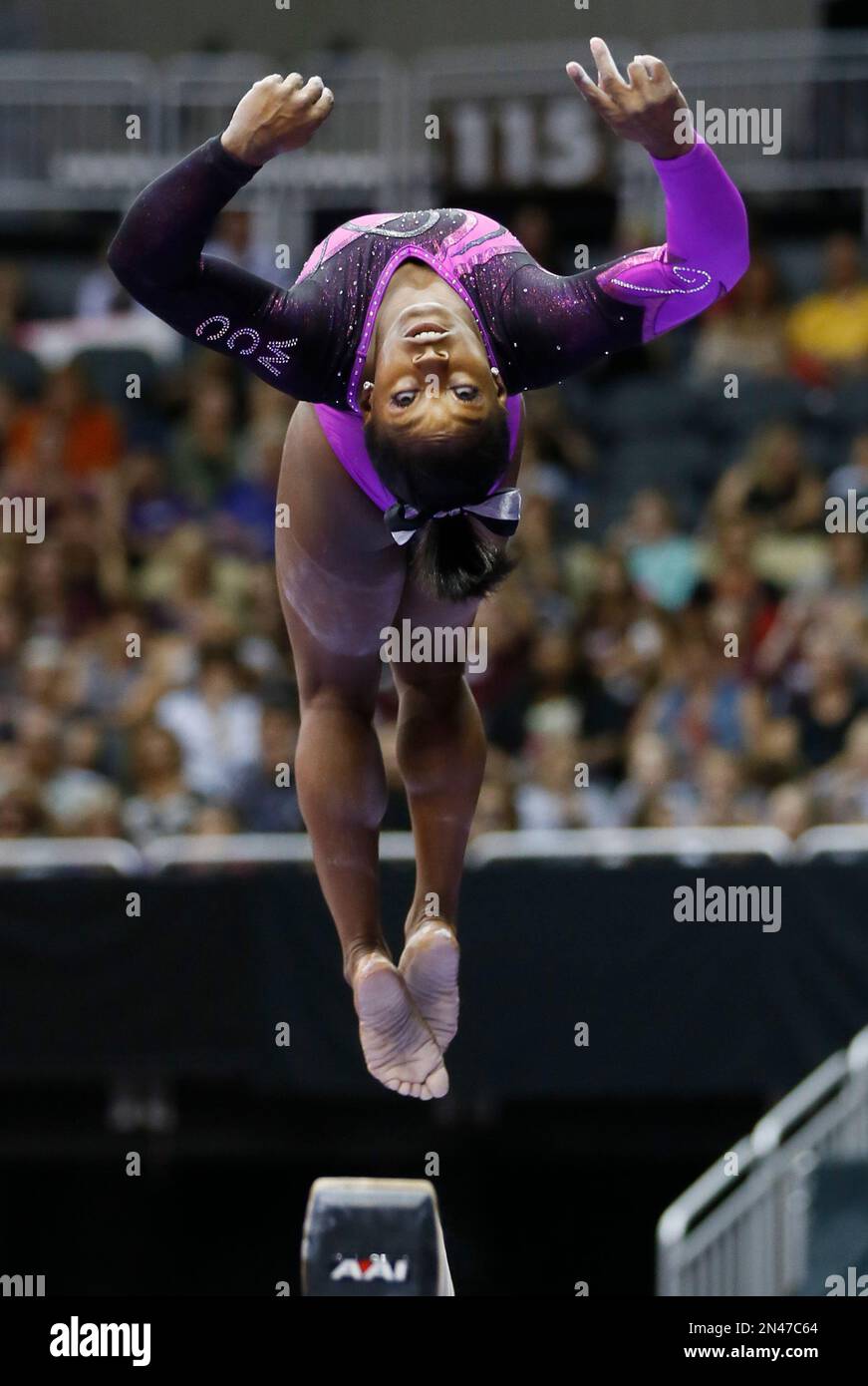 Simone Biles performs on the balance beam at the U.S. women's gymnastic ...