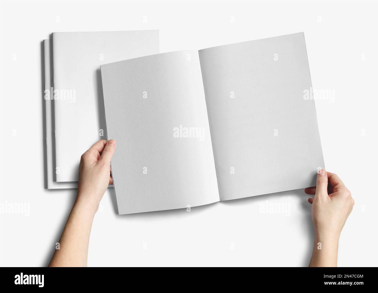 A4 Advertising Magazine Brochure Mockup 3D Rendering with Hand Stock ...