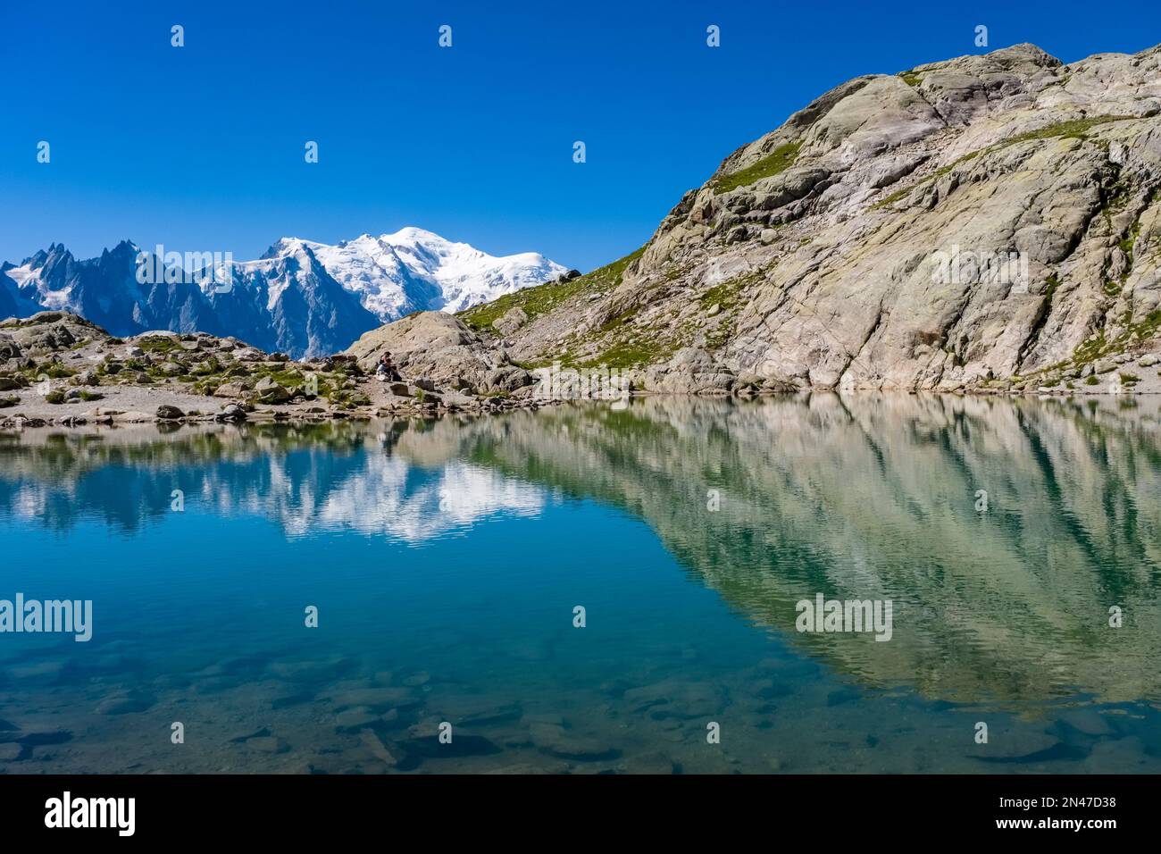 The summits of Aiguille du Midi, Mont Blanc du Tacul, Mont Maudit, Mont Blanc and Dome du ...