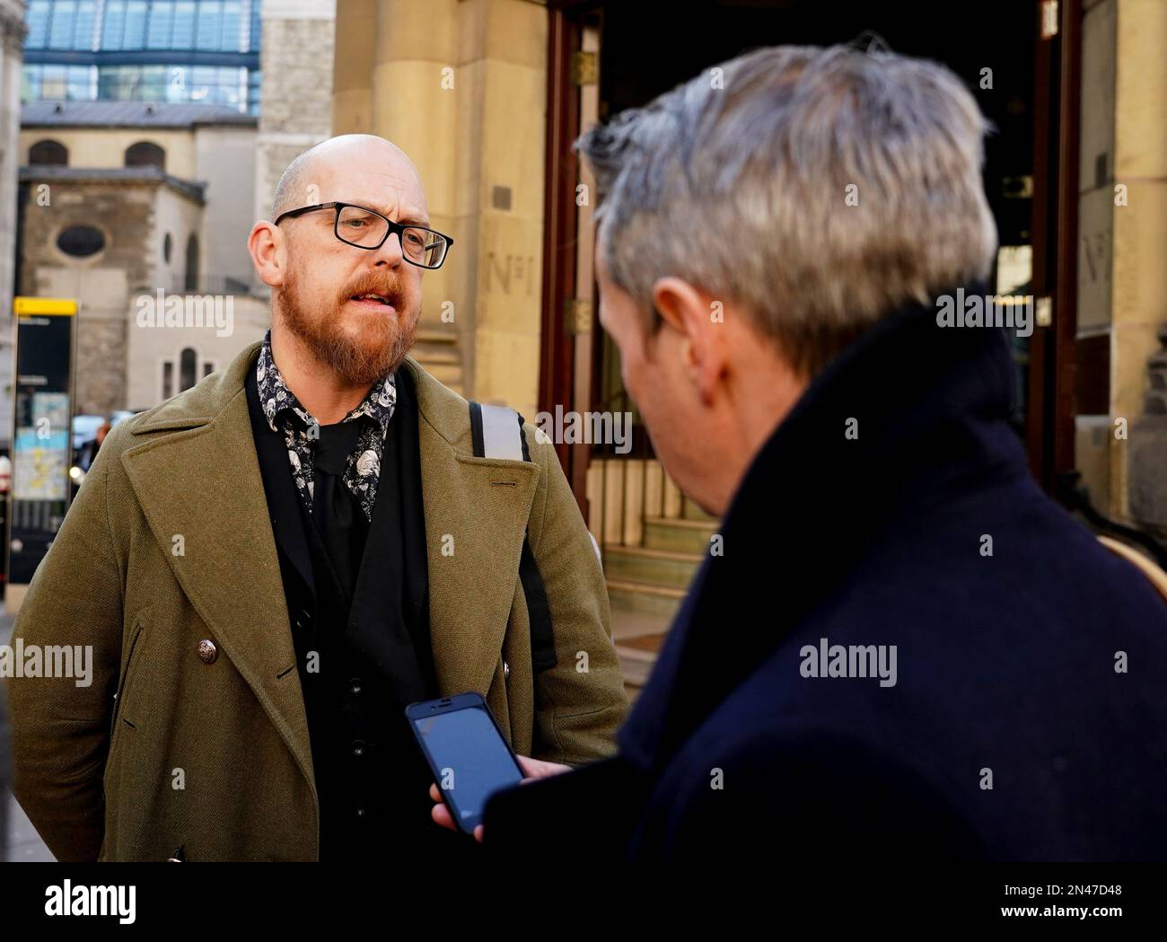 Climate activist Simon Bramwell speaks to the media outside the City Of ...