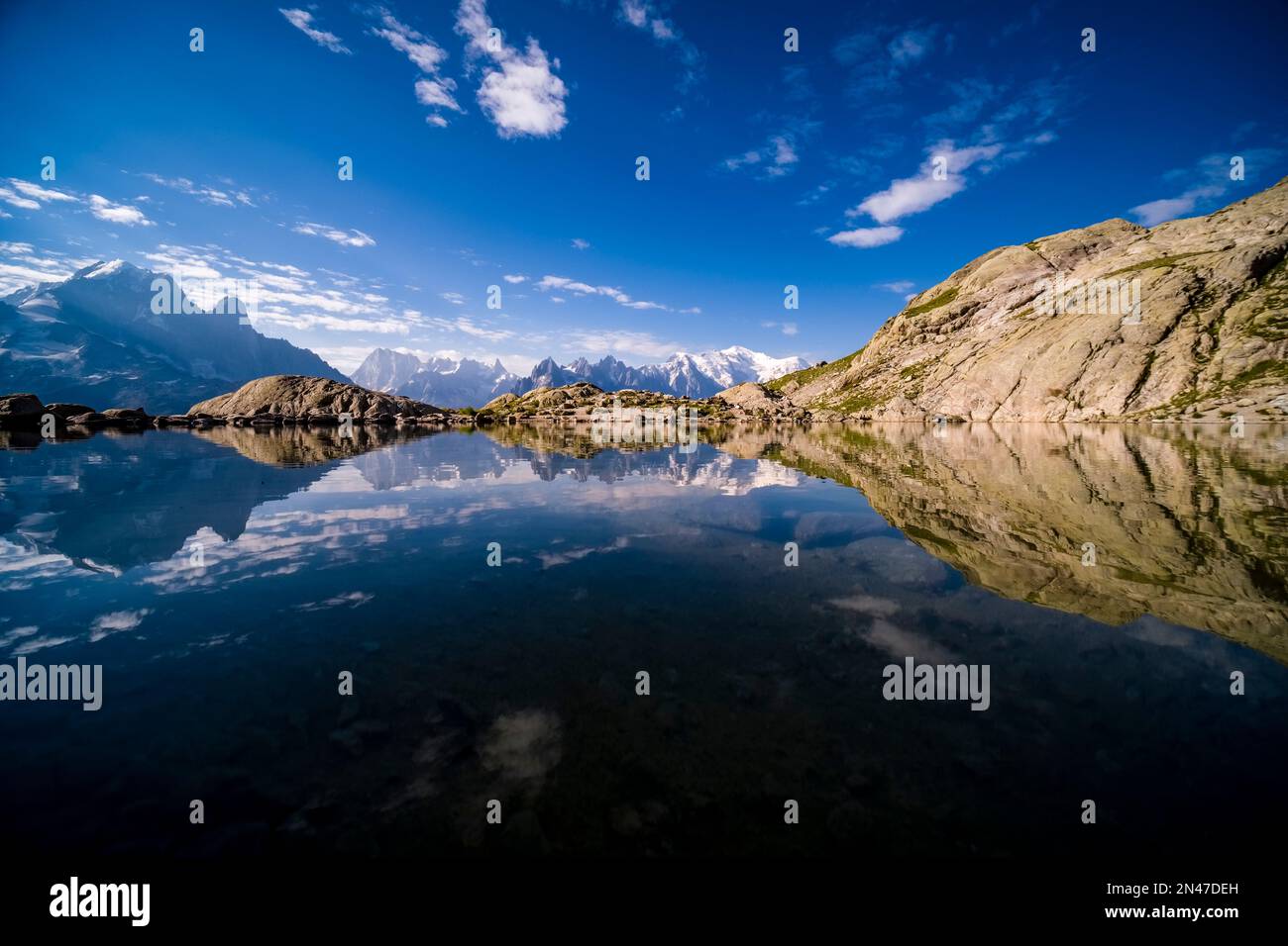 The peaks of the Mont Blanc massif are reflecting on the surface of Lac Blanc Stock Photo - Alamy