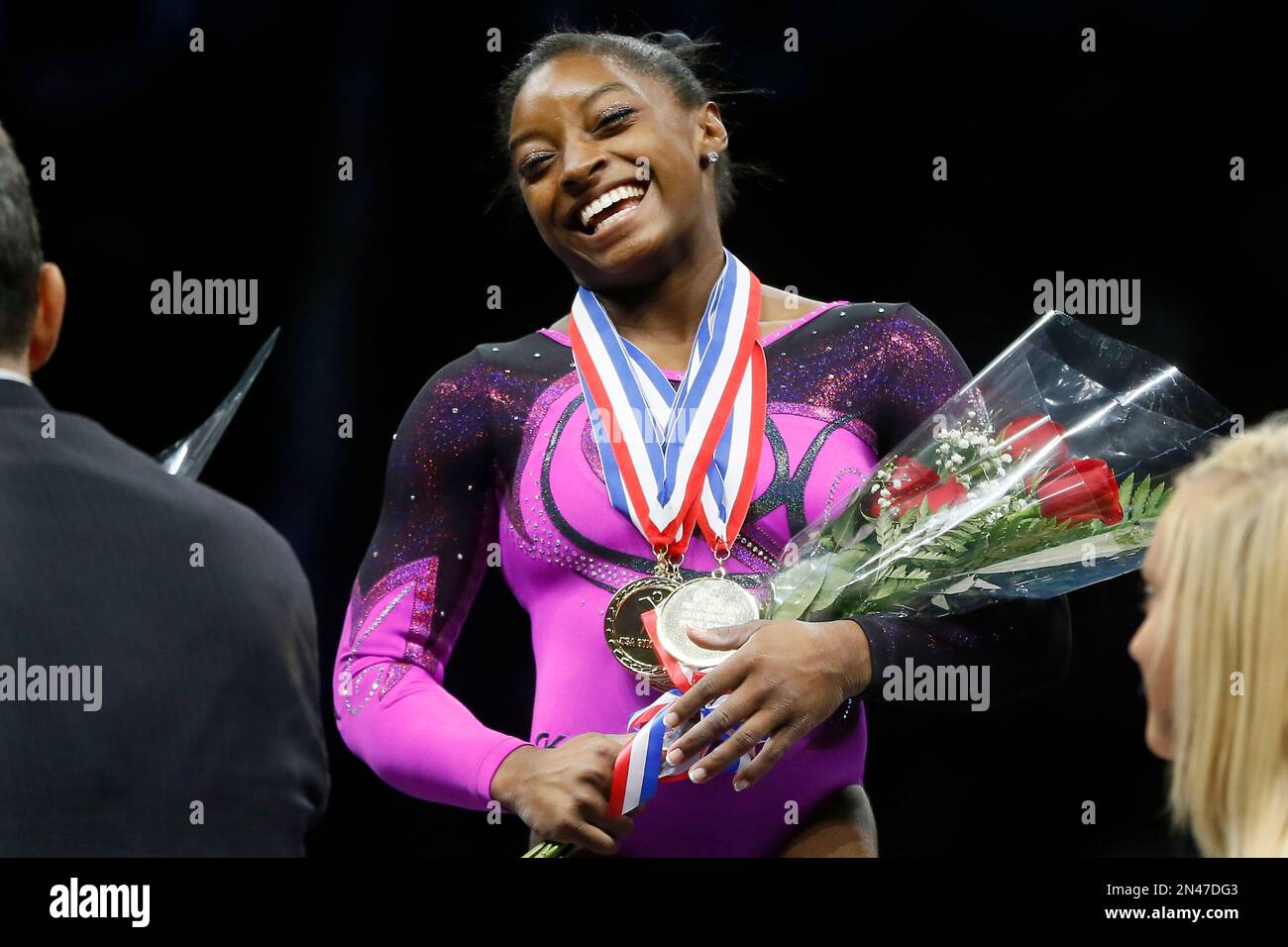 Simone Biles smiles after getting her gold medal at the gymnastics U.S ...