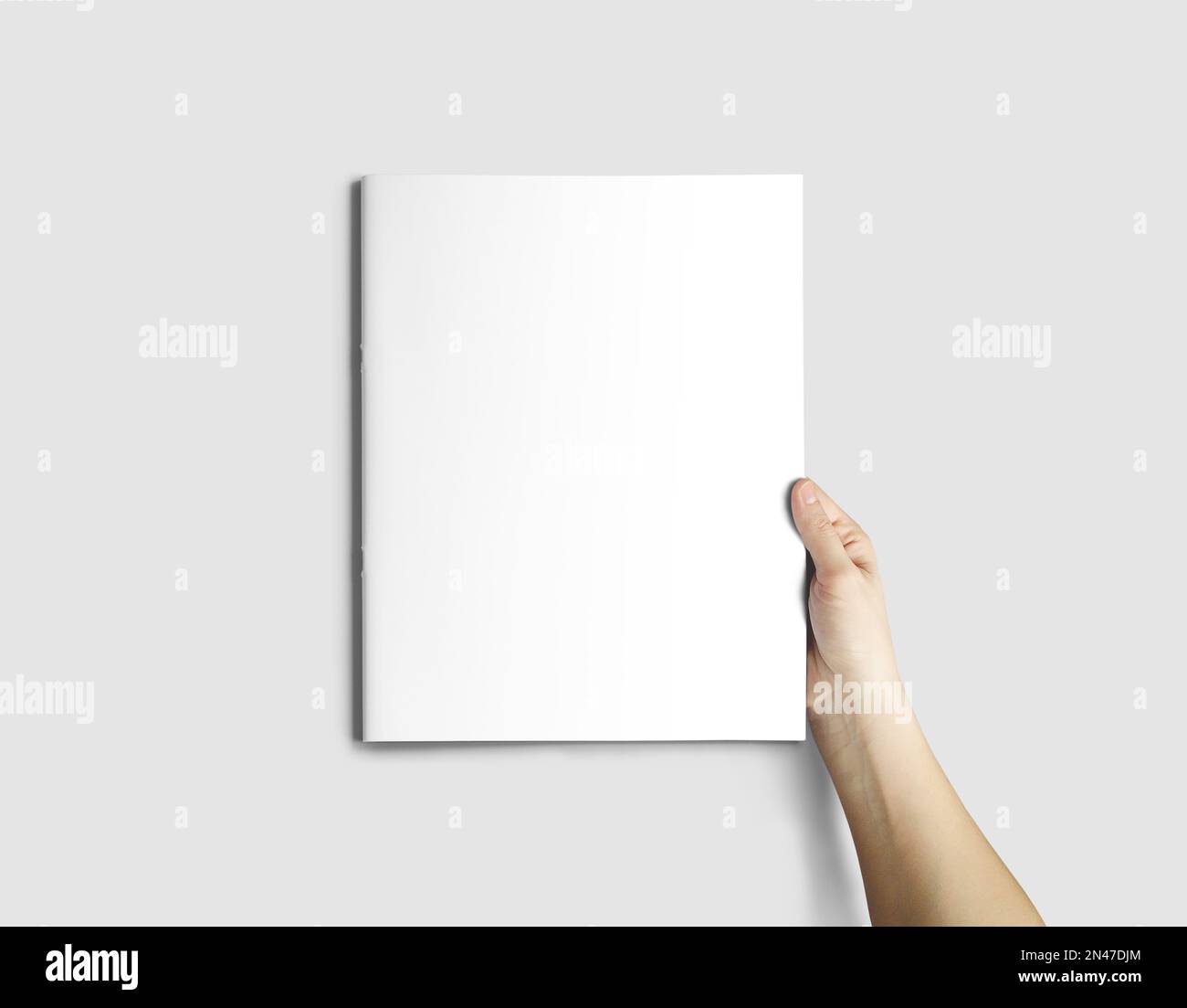 A4 Advertising Magazine Brochure Mockup 3D Rendering with Hand Stock ...