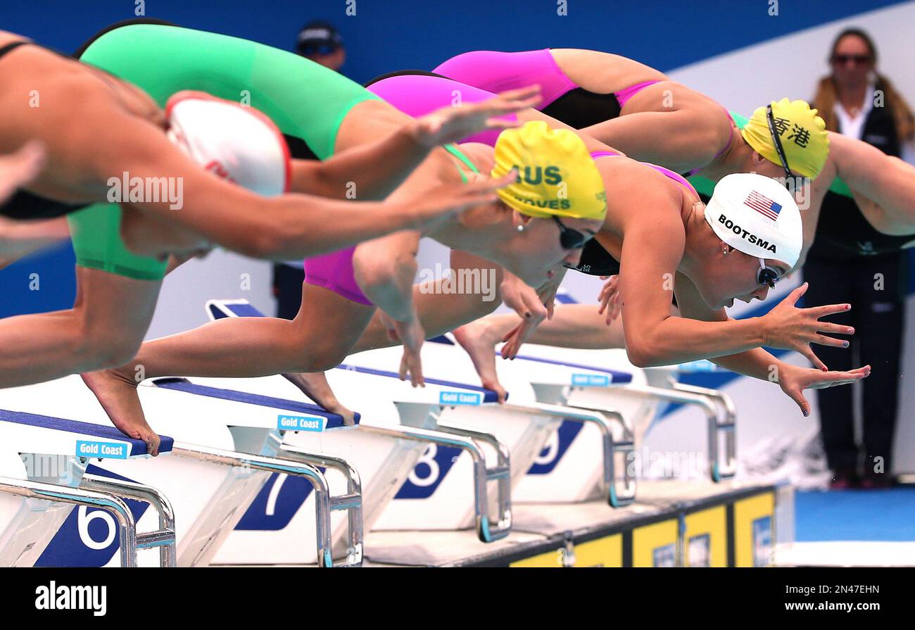 Starters including Rachel Bootsma of the U.S. right white cap, dive in ...