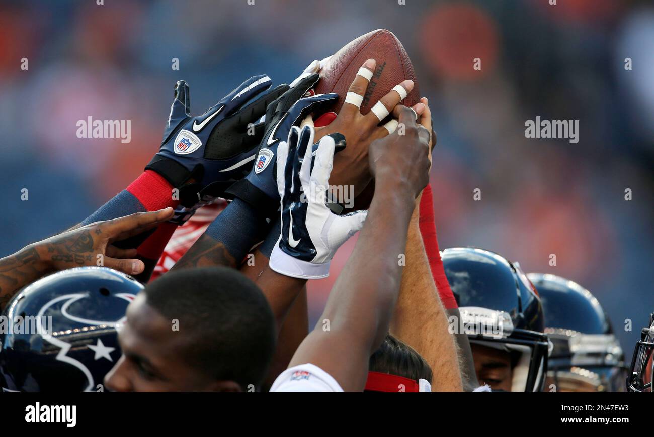 The Houston Texans huddle up prior to an NFL preseason football game ...