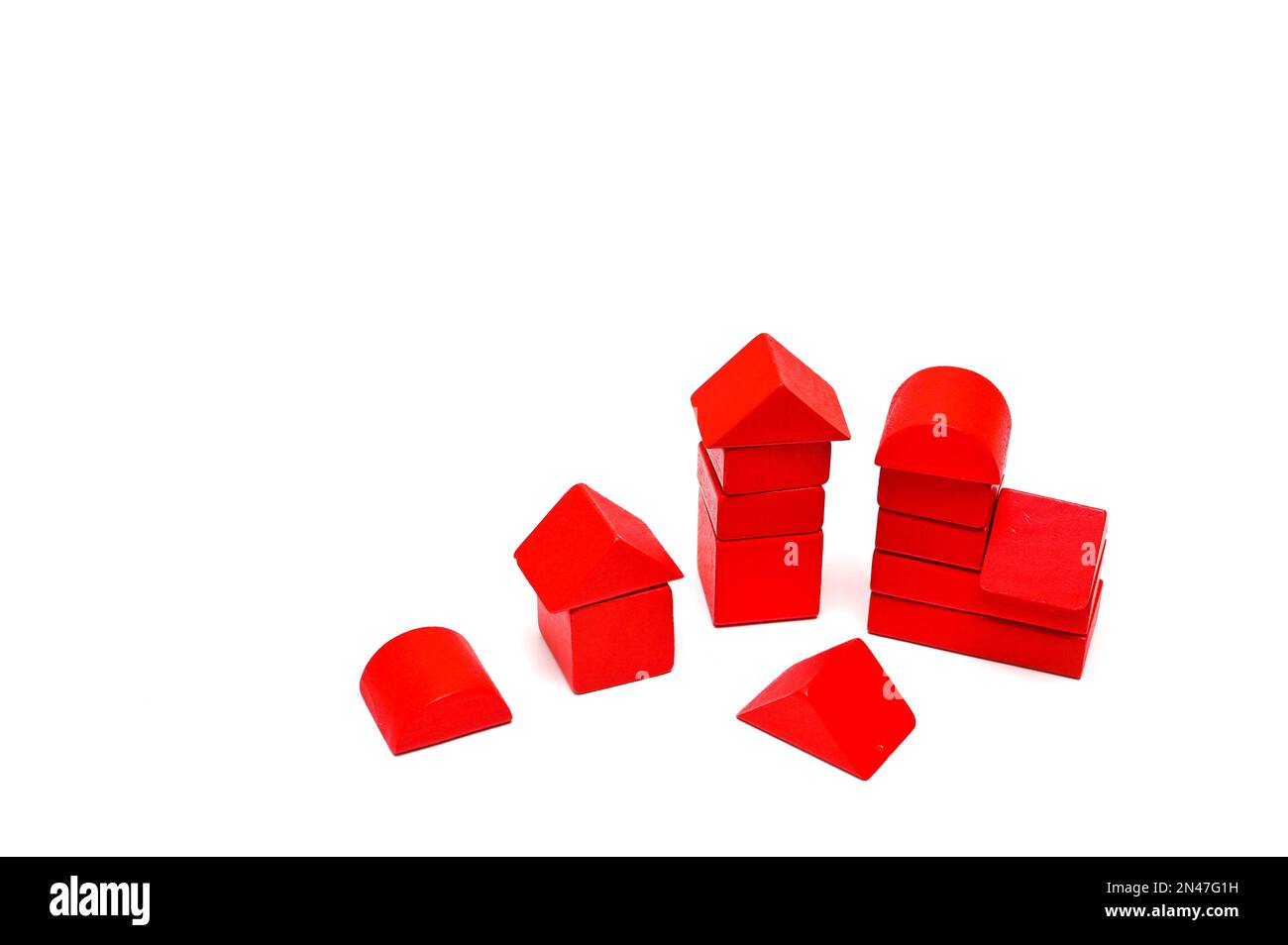Children's game wooden red cubes figures. isolated on a white ...