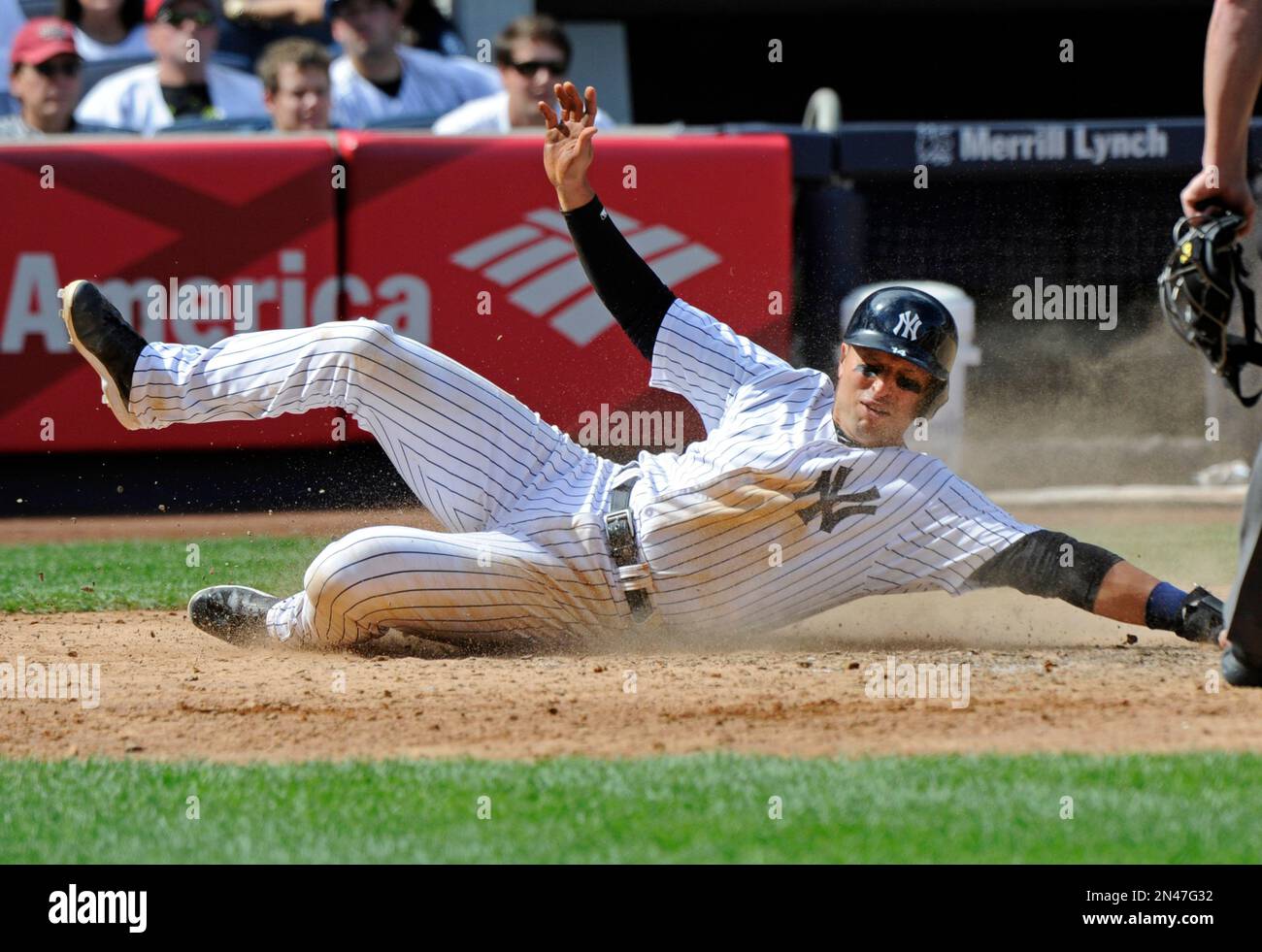 New York Yankees' Martin Prado comes in score on a sacrifice fly during ...