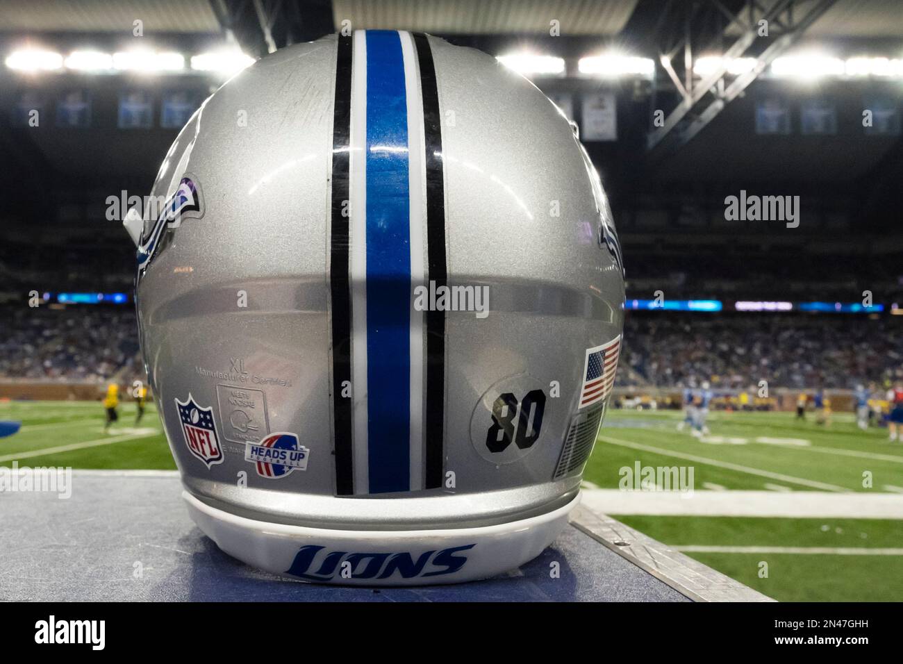 Helmets of Detroit Lions tight end Joseph Fauria (80) on the sideline ...