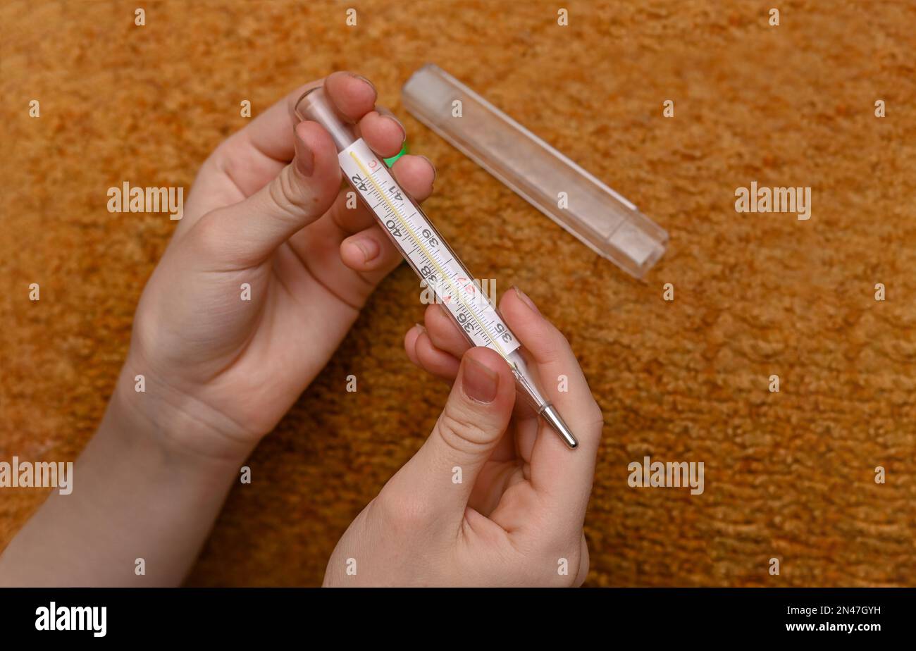 mercury traditional thermometer for the body Stock Photo - Alamy