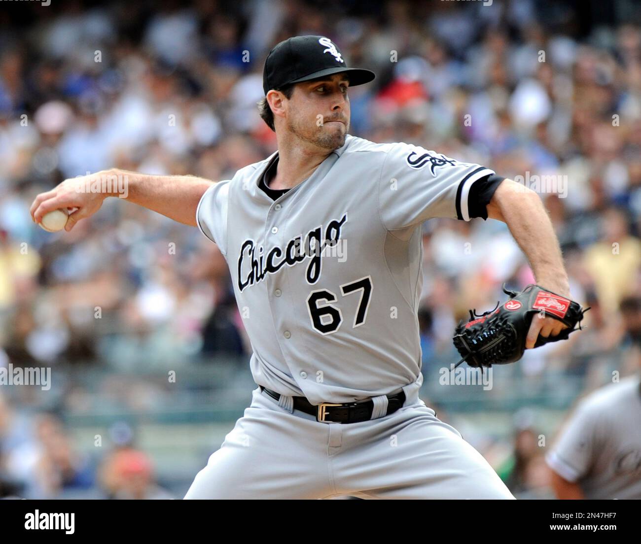 Chicago White Sox pitcher Scott Carroll delivers to the New York ...