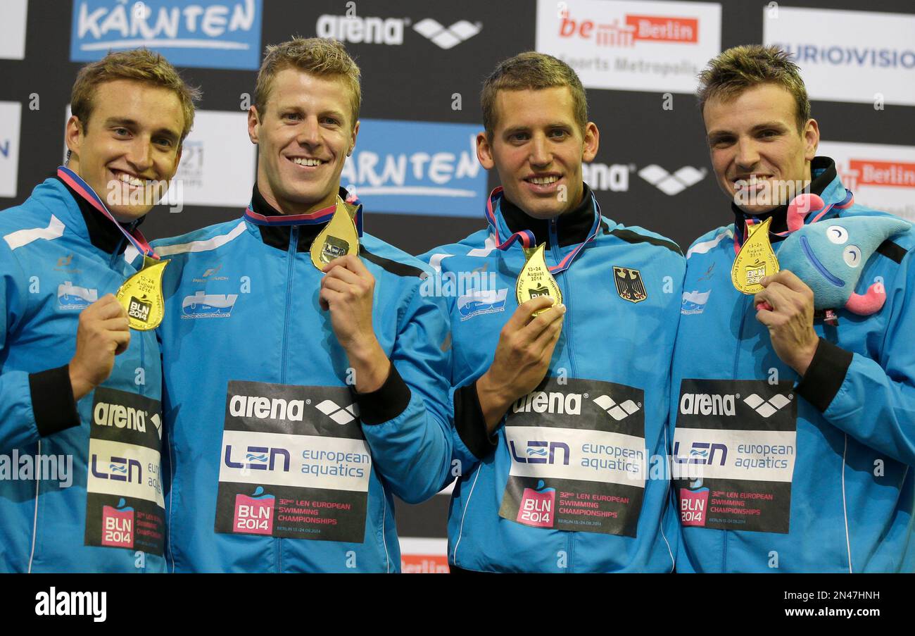 Germany's 4x200m freestyle relay team show off their gold medals during ...