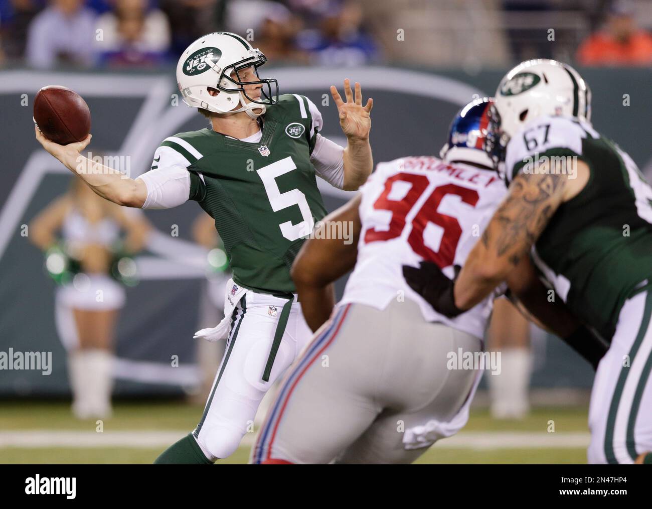 New York Jets quarterback Matt Simms (5) passes against the New York ...