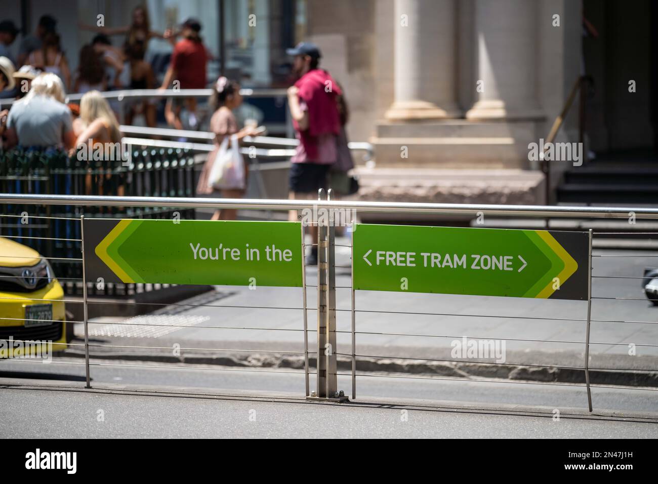 tennis fan watching a tennis match at the australian open eating food ...