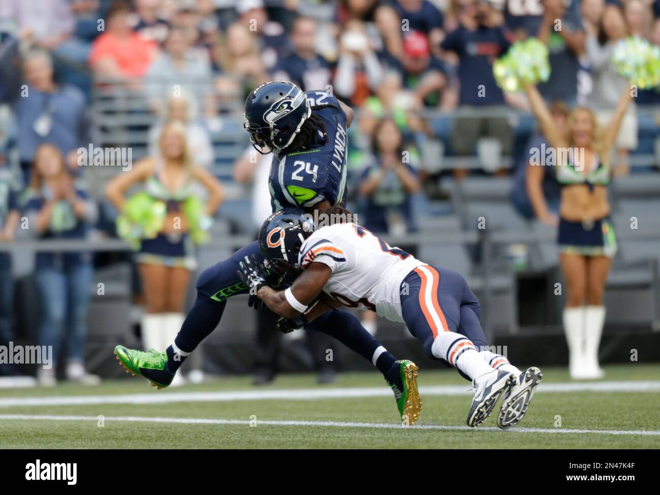 Seattle Seahawks' Marshawn Lynch is hit by Chicago Bears' Danny McCray ...
