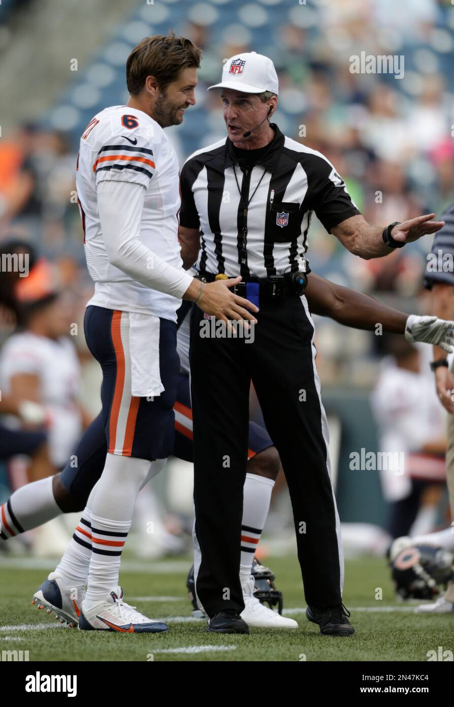 Chicago Bears quarterback Jay Cutler speaks with an official before a ...