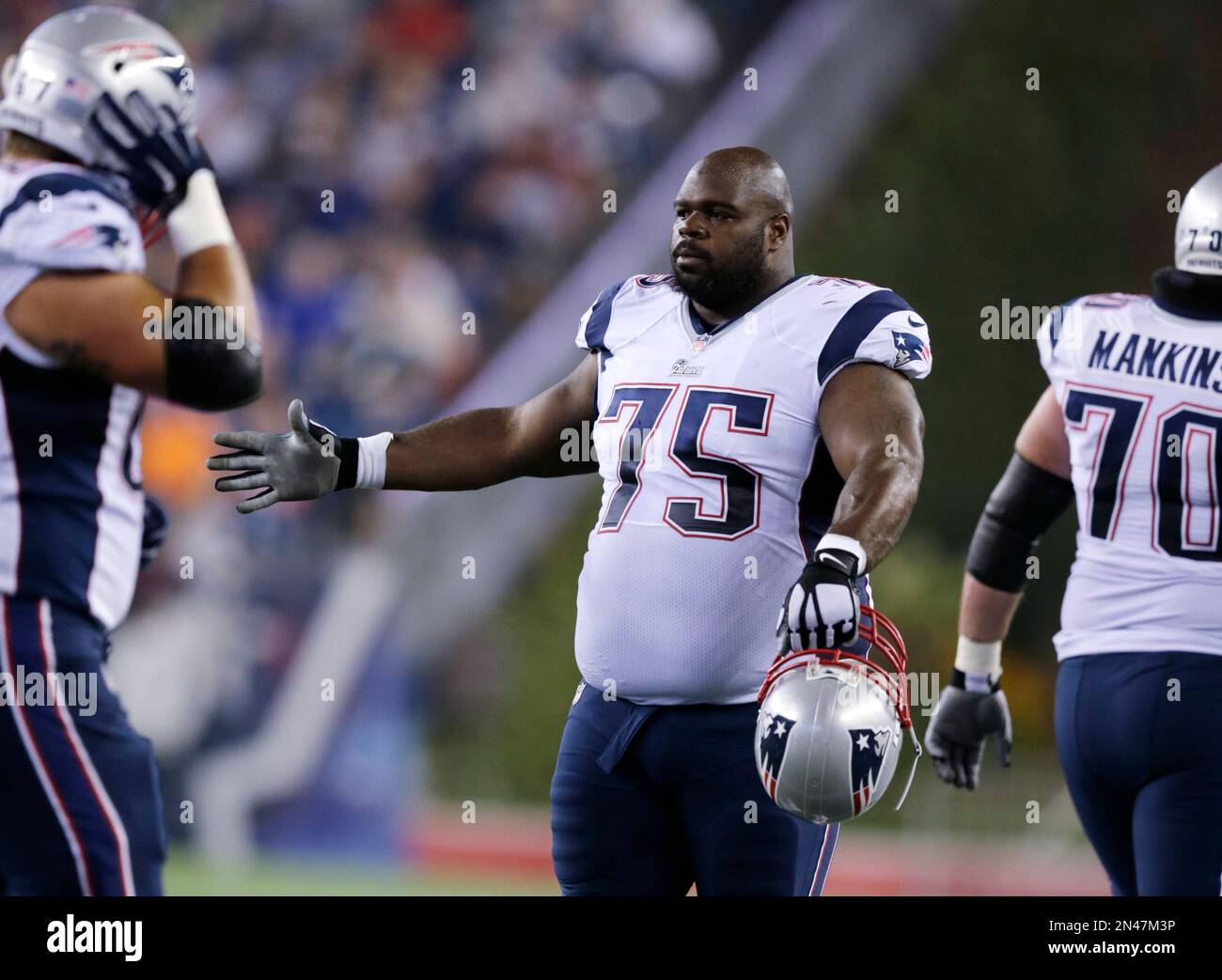 New England Patriots defensive tackle Vince Wilfork (75) waits for the ...