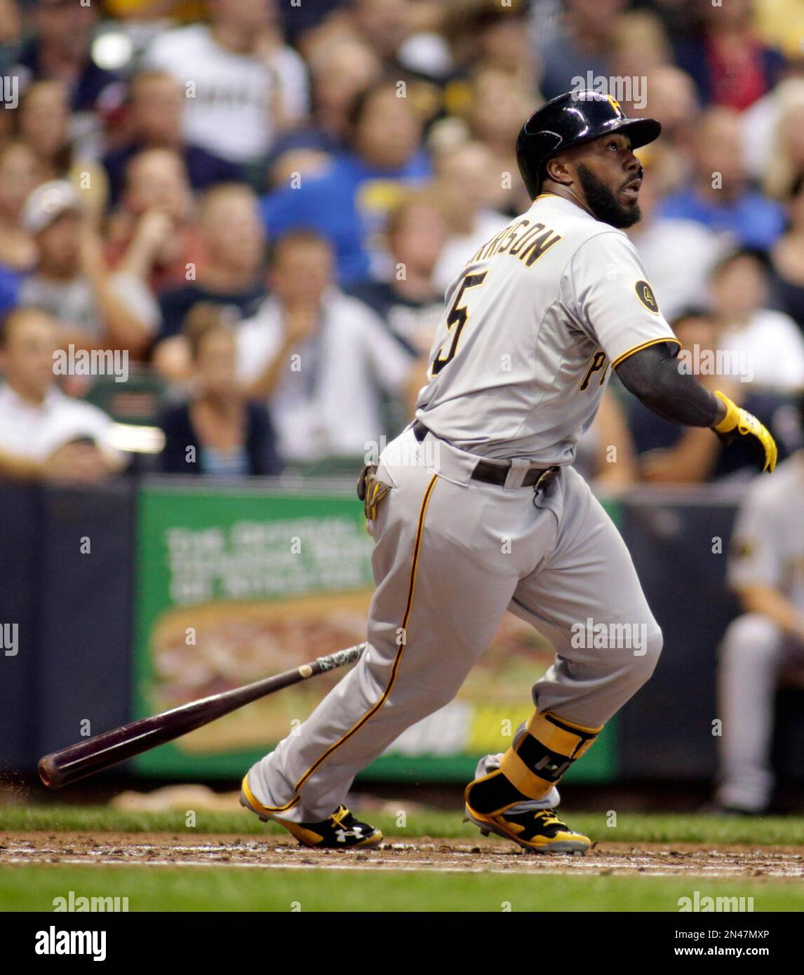 Pittsburgh Pirates' Josh Harrison watches the ball after he hit a two ...
