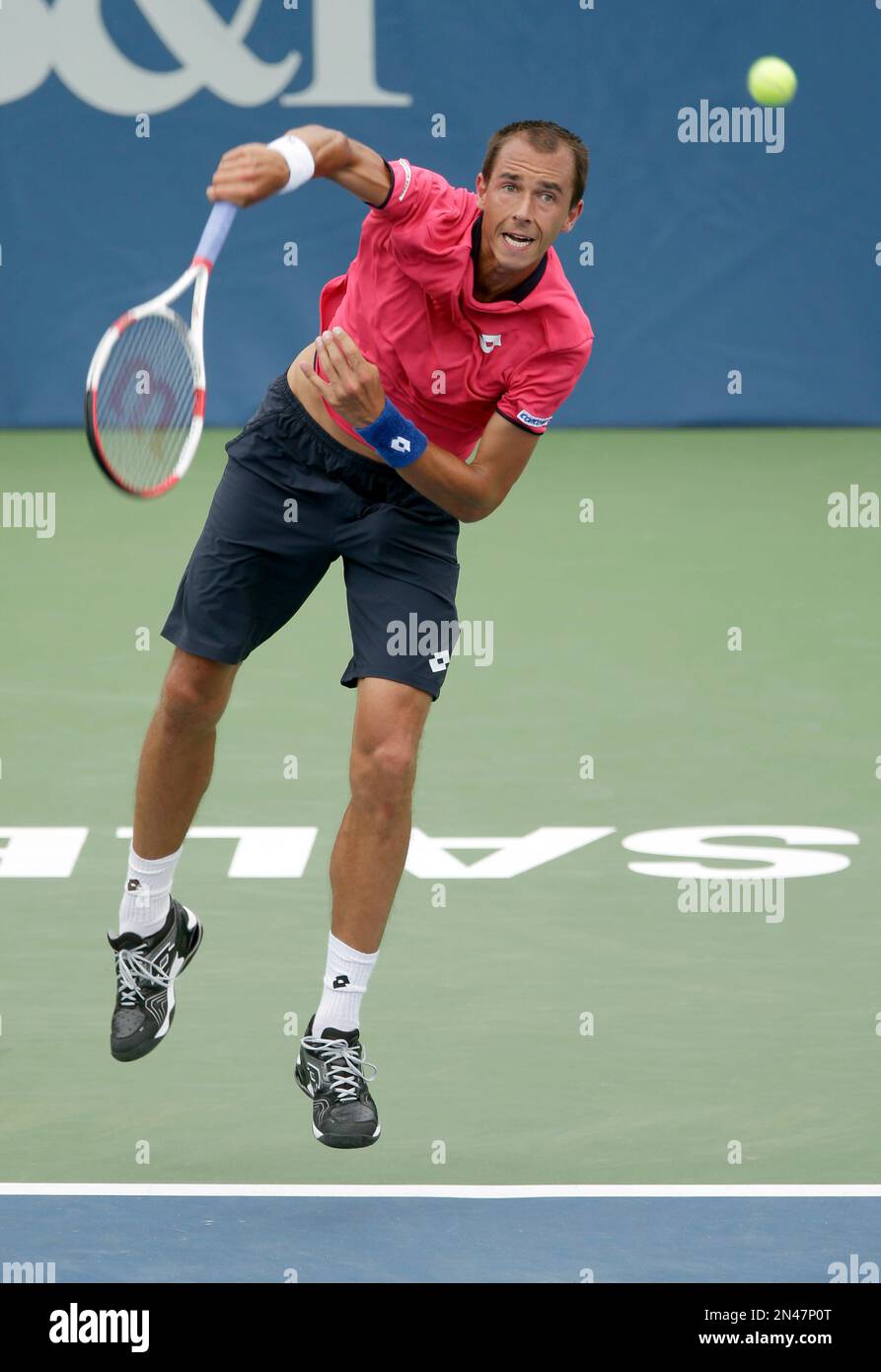 Lucas Rosol, of Czech Republic, serves to Yen-Hsun Lu, of Taiwan, in ...