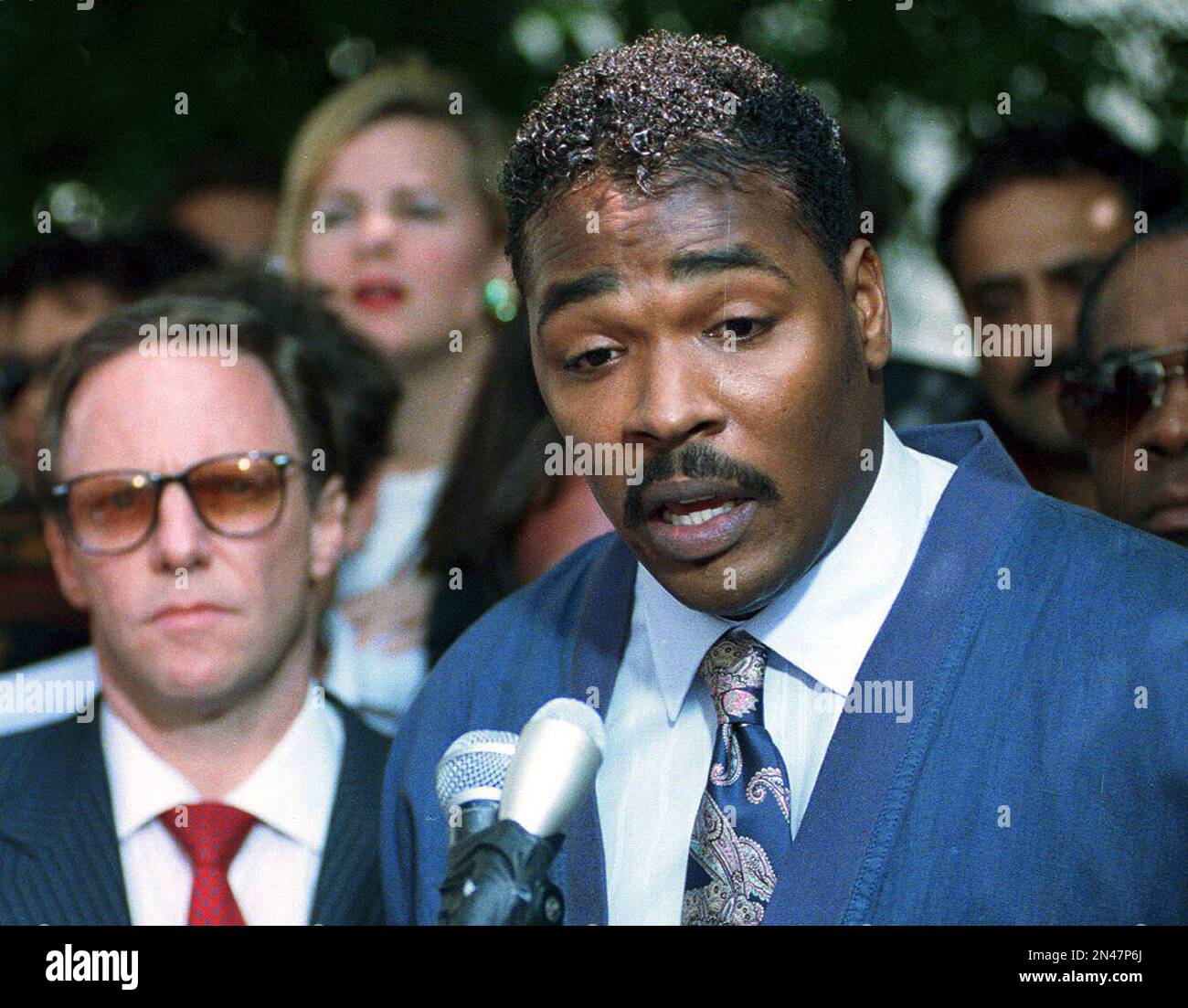FILE - This May 1,1992 file photo shows Rodney King, right, accompanied ...