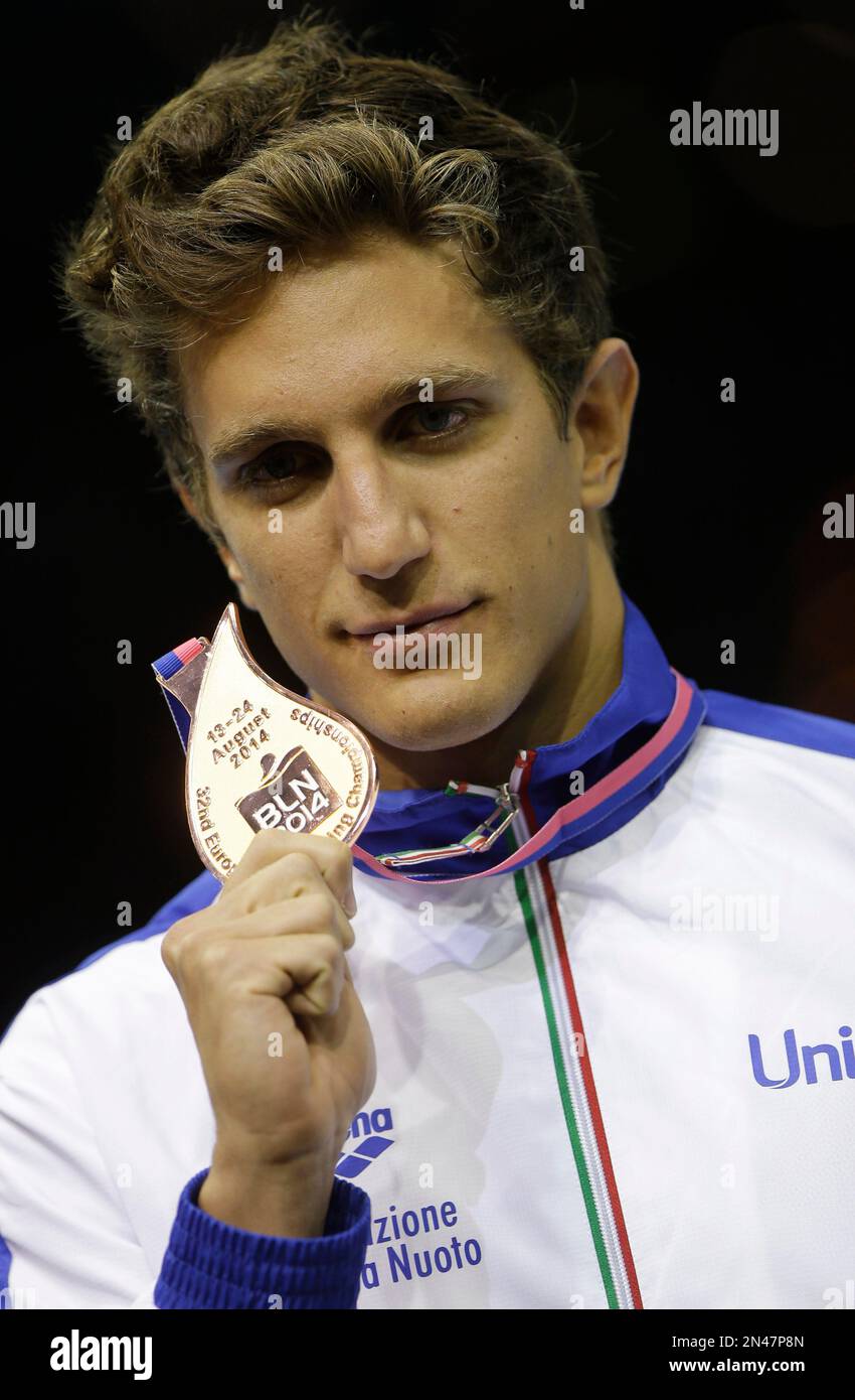 Italy's Luca Leonardi shows off his bronze medal during the ceremony ...