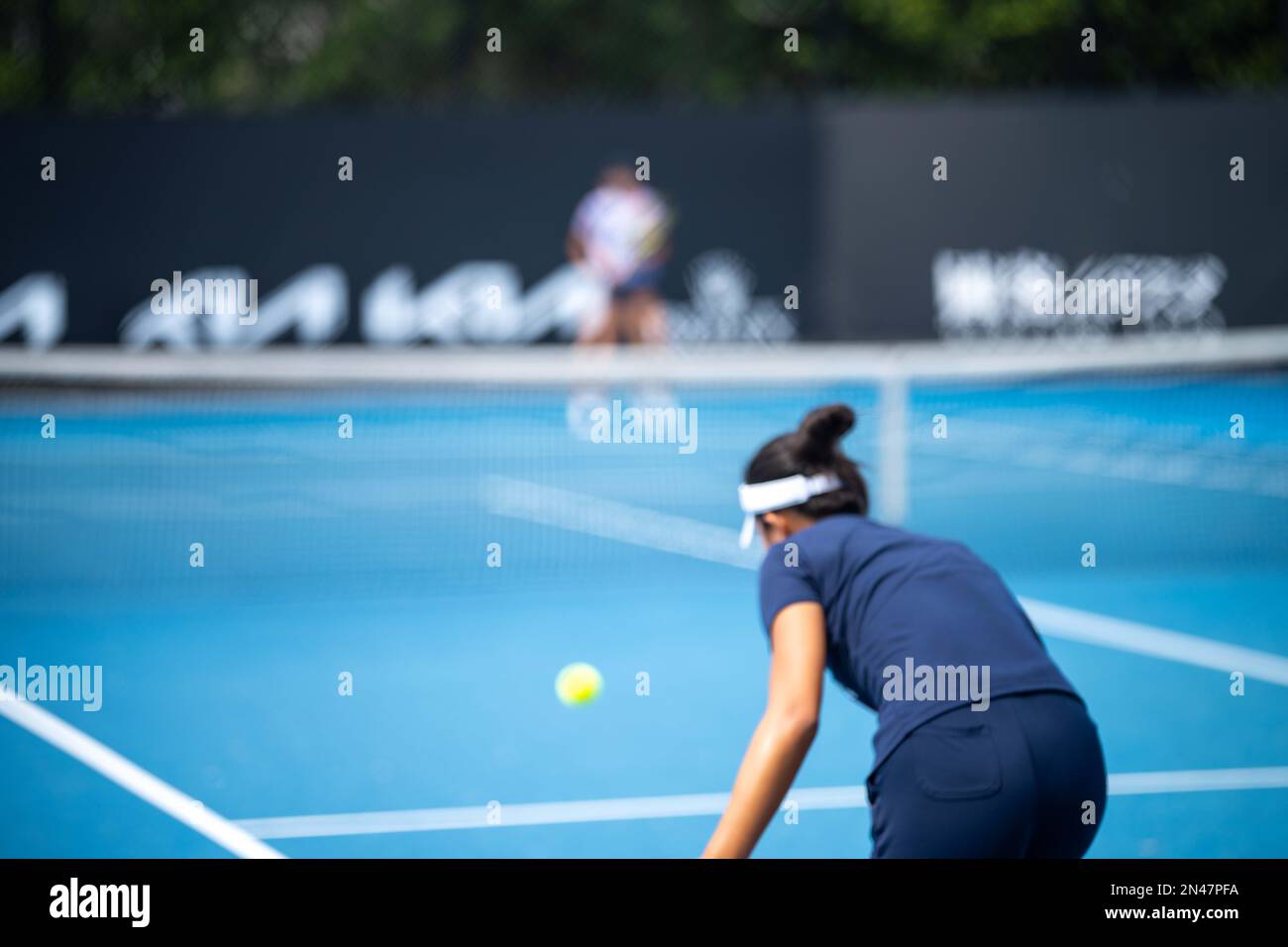 Beautiful female athlete playing tennis. Amateur female tennis player ...