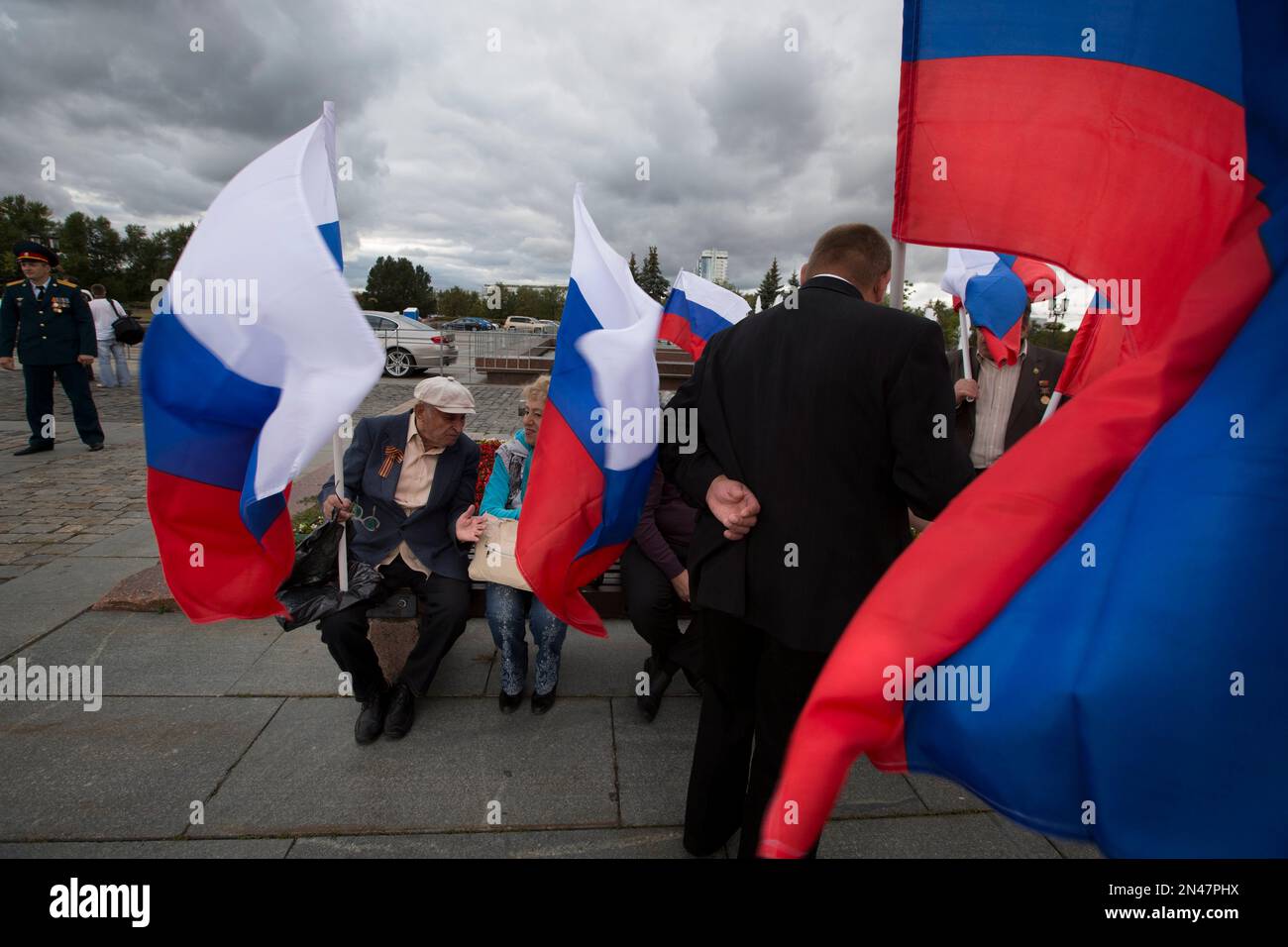 People holding Russian flags gather to mark National Flag Day in Moscow ...