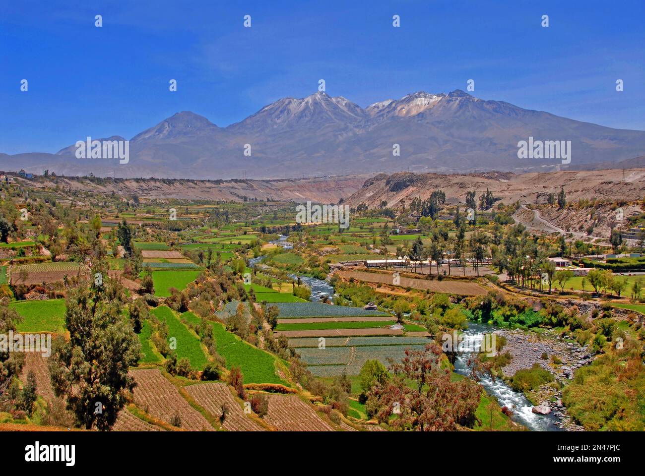 Chili river valley and Misty volcano Arequipa Peru Stock Photo - Alamy