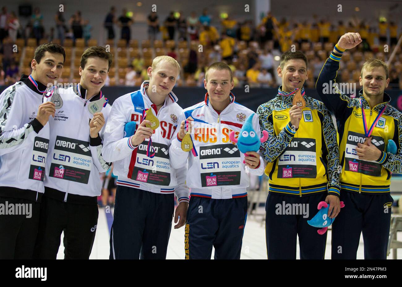 From left, silver medal winners Germany's Stephan Feck and Patrick ...