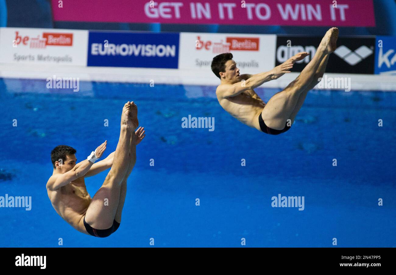 Silver medal winners Germany's Stephan Feck, left, and Patrick Hausding ...