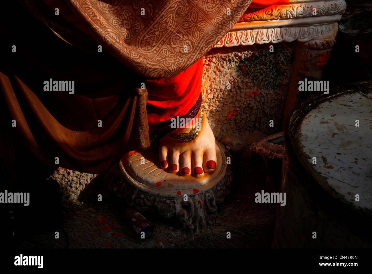 The toenails of an idol of elephant-headed Hindu God Ganesha are seen ...