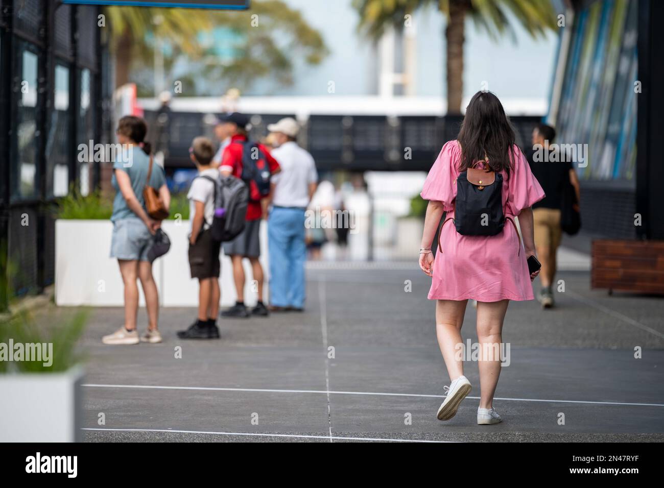 female Professional athlete Tennis player playing on a court in a ...