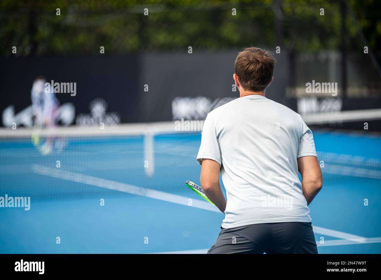 Beautiful female athlete playing tennis. Amateur female tennis player ...
