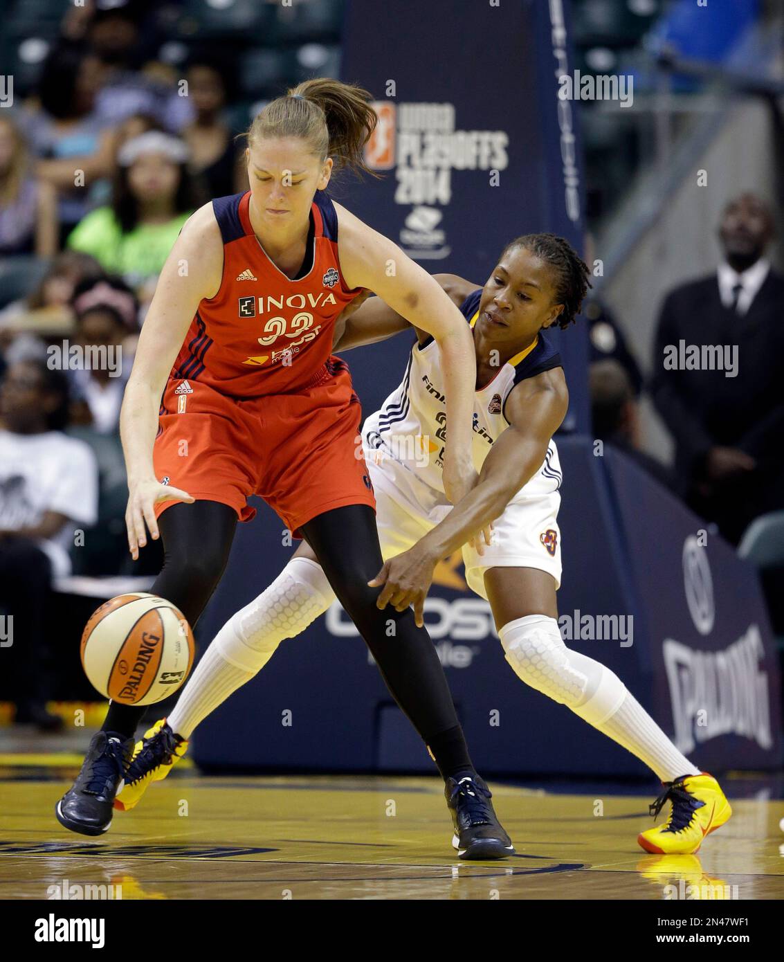 Washington Mystics' Emma Meesseman is defended by Indiana Fever's ...