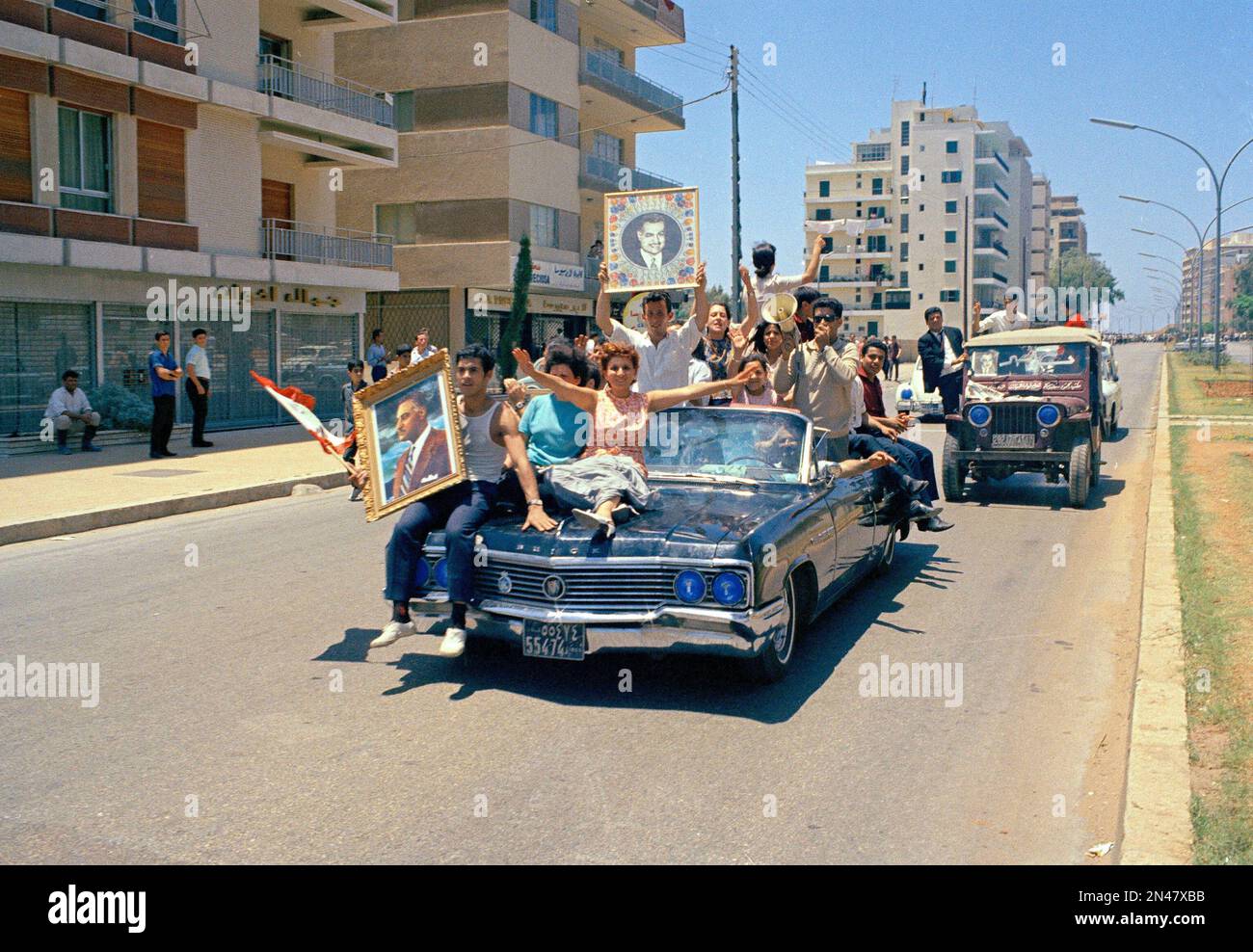 Cars from Lebanon carrying demonstrators in Jordan are pictured, June 8 ...