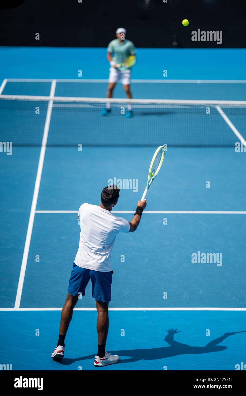 Beautiful female athlete playing tennis. Amateur female tennis player ...