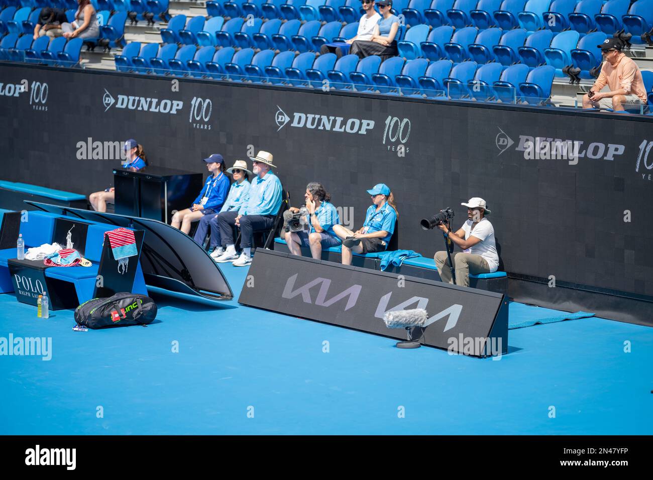 female Professional athlete Tennis player playing on a court in a ...